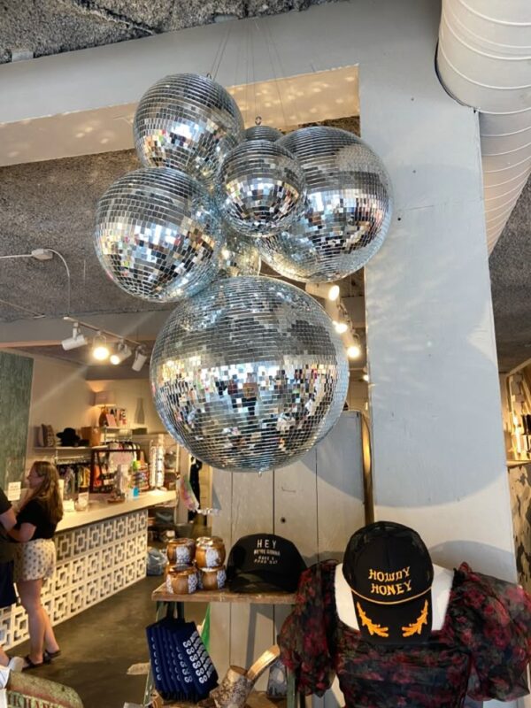 How to use disco balls in a retail store for an eye-catching display ...